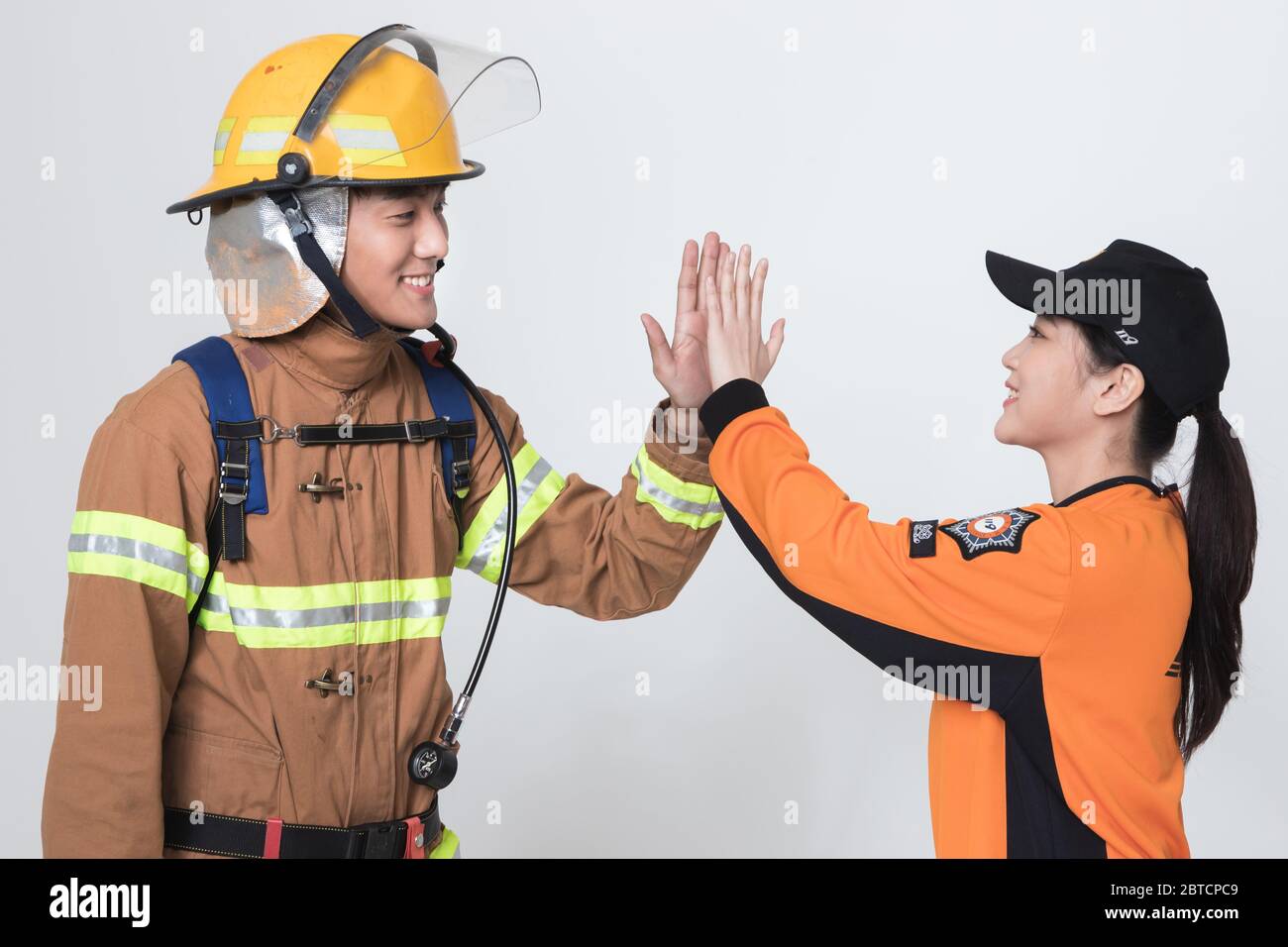Male firefighter in high hi-res stock photography and images - Alamy