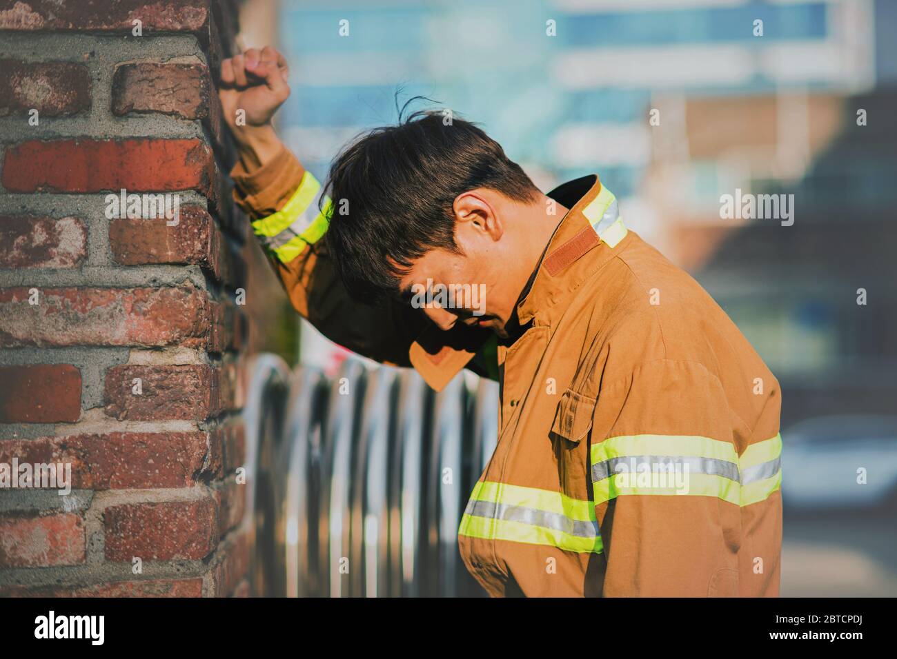 Asian male and female firefighter portrait, young smiling fireman in ...