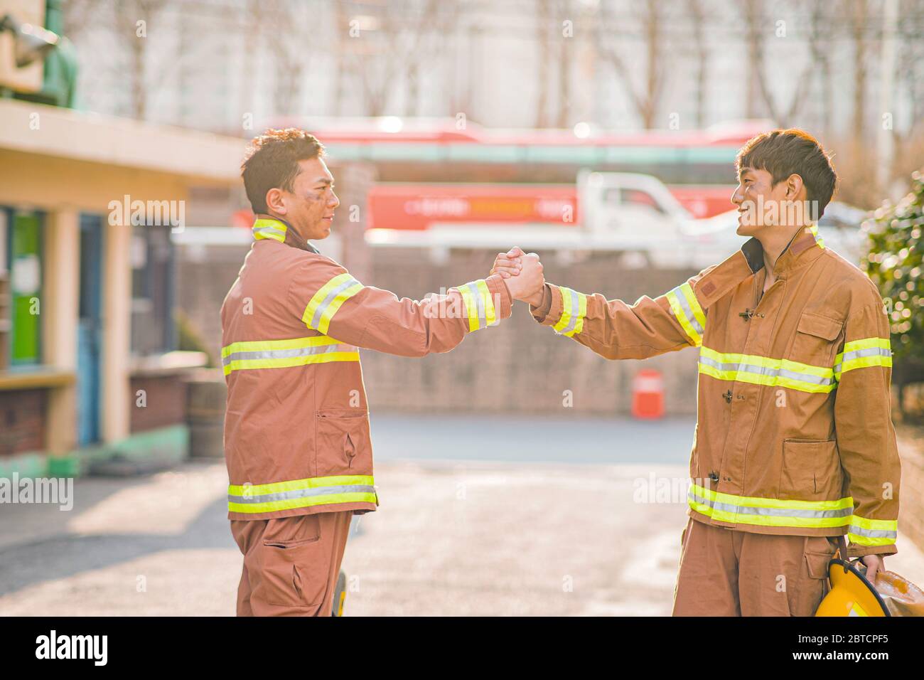 Male firefighter in high hi-res stock photography and images - Alamy