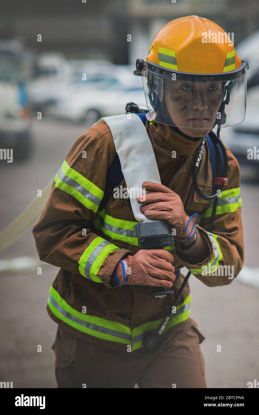Young asian female paramedic hi-res stock photography and images - Alamy