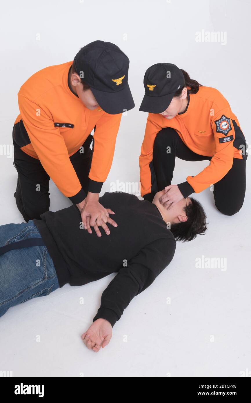 Asian male and female firefighter portrait, young smiling fireman in ...