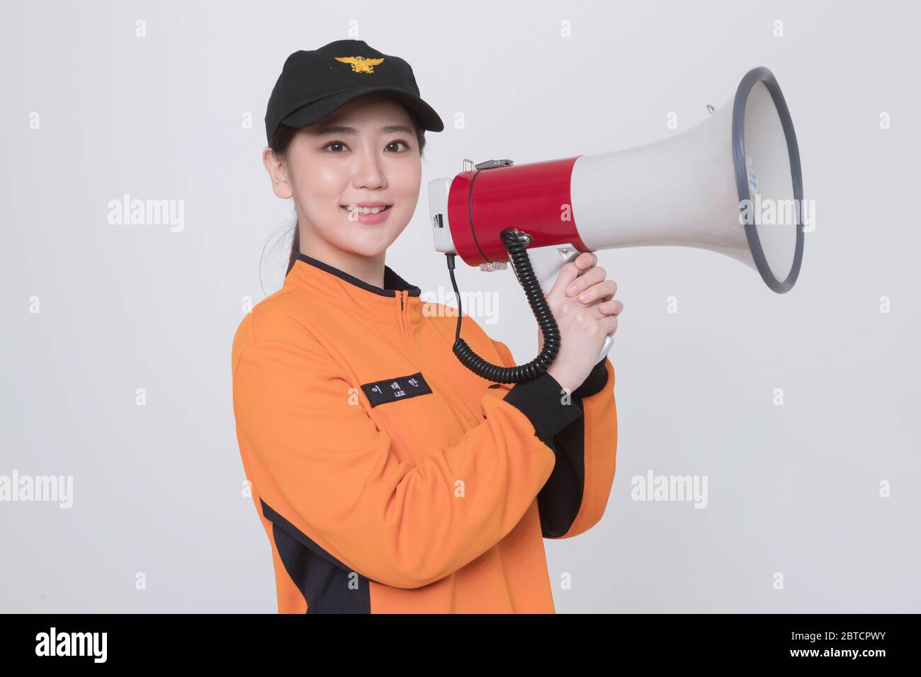 Asian male and female firefighter portrait, young smiling fireman in ...