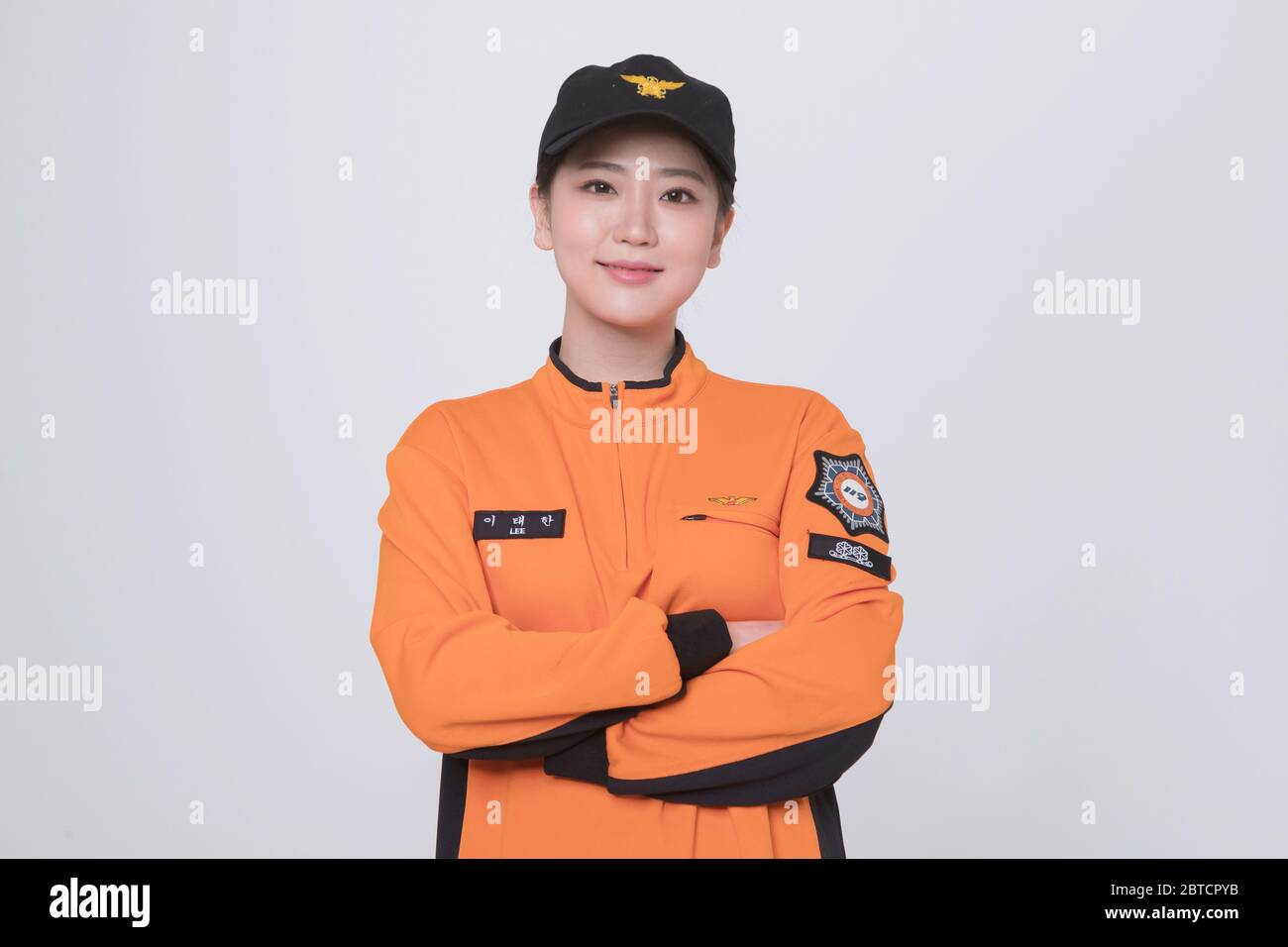 Asian male and female firefighter portrait, young smiling fireman in ...