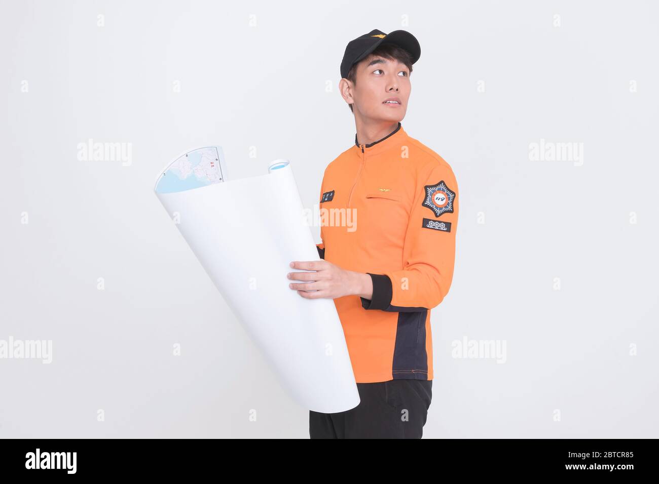 Asian male and female firefighter portrait, young smiling fireman in ...