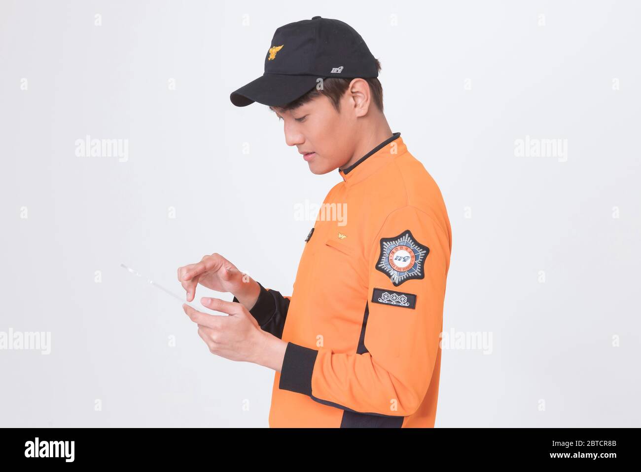 Asian male and female firefighter portrait, young smiling fireman in ...