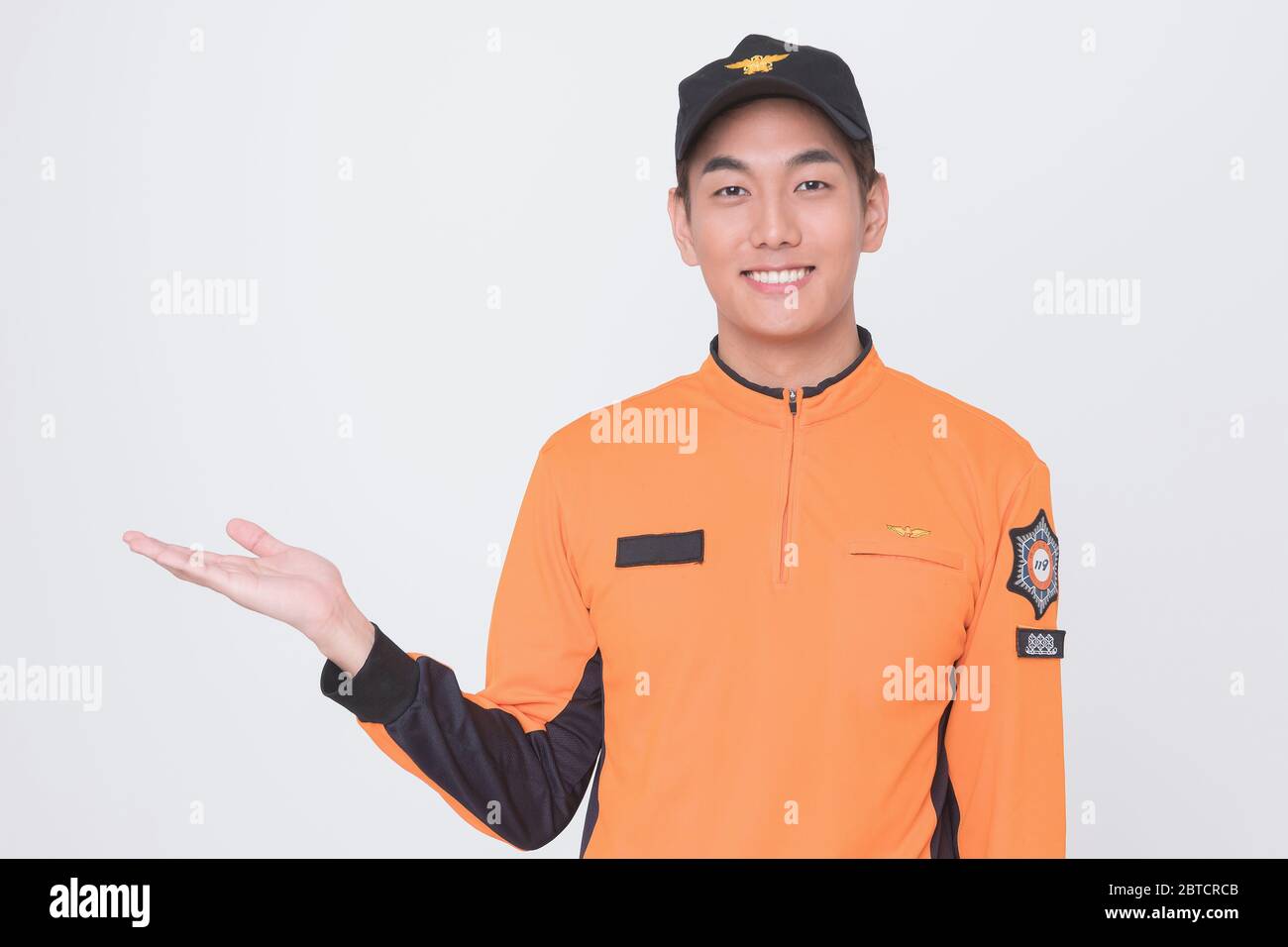 Asian male and female firefighter portrait, young smiling fireman in ...