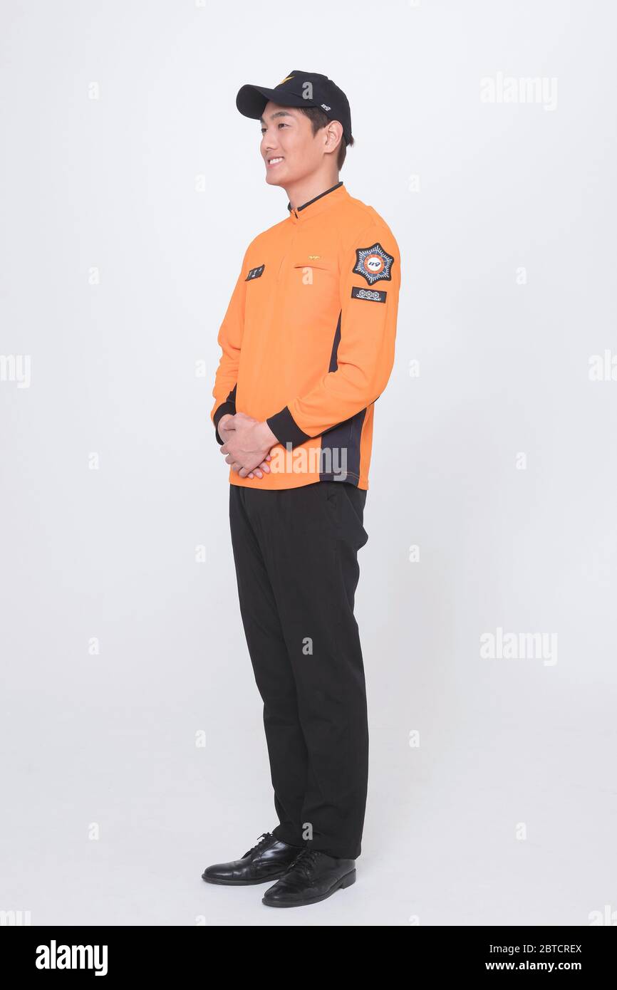 Asian male and female firefighter portrait, young smiling fireman in ...