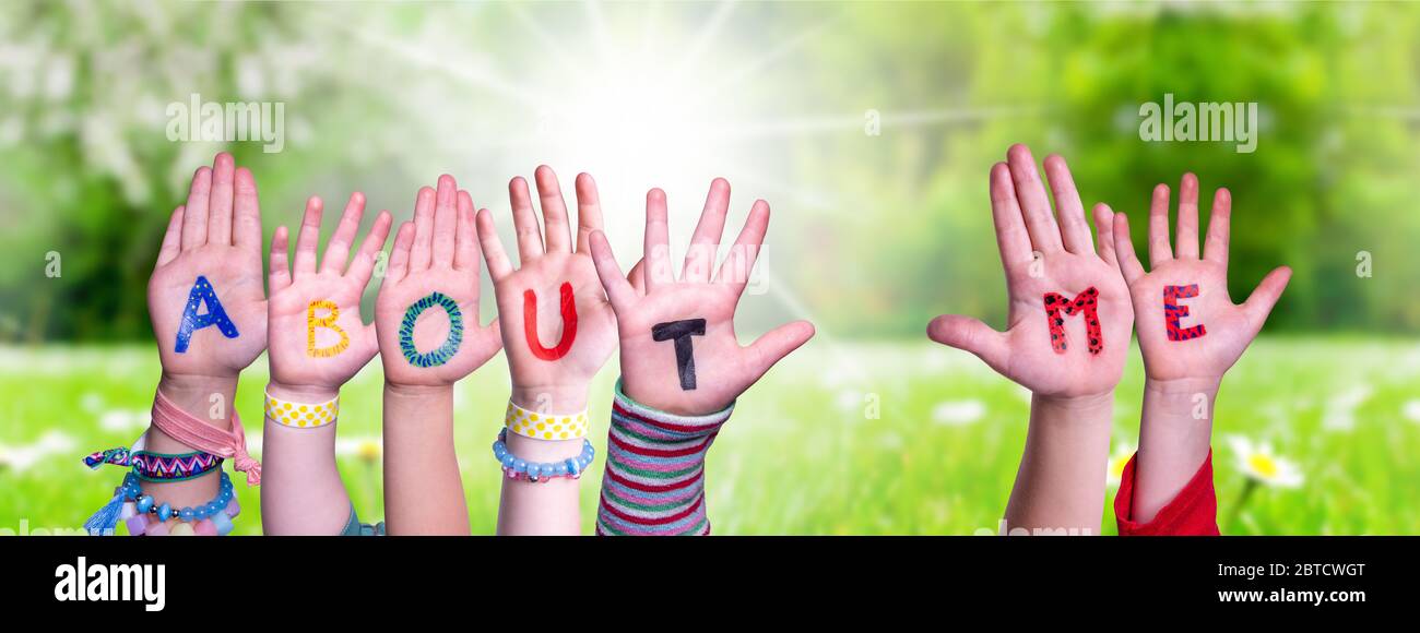 Children Hands Building Word About Me, Grass Meadow Stock Photo - Alamy