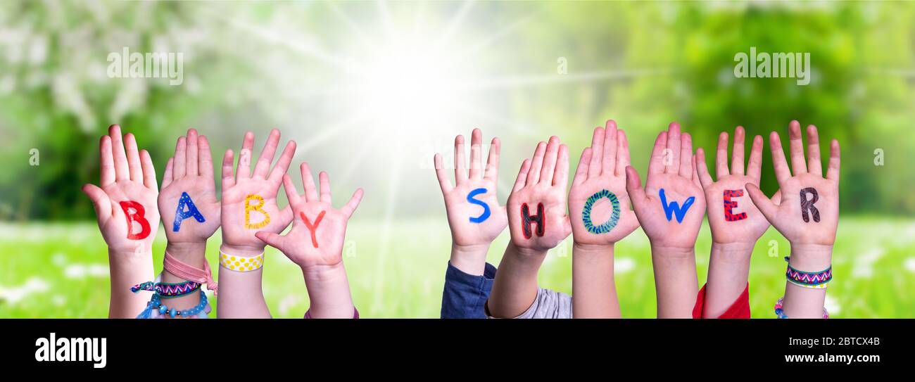 Children Hands Building Word Baby Shower, Grass Meadow Stock Photo - Alamy
