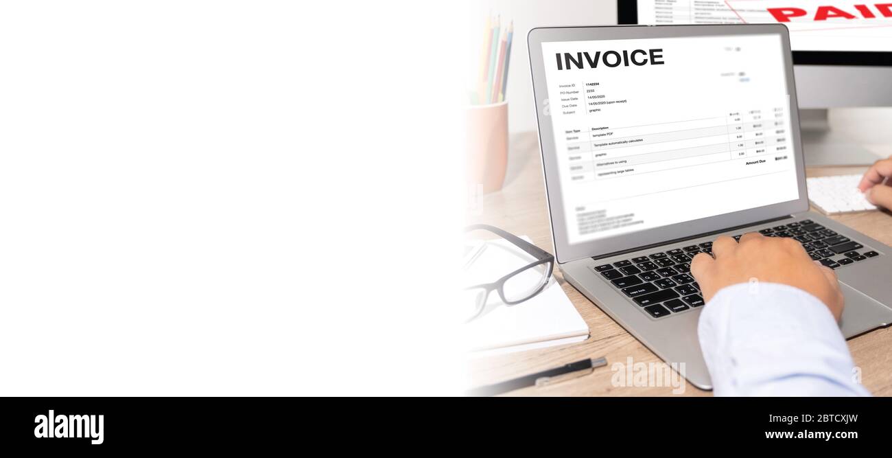 Businessman work Using The Computer Calculating Invoice In Office ...