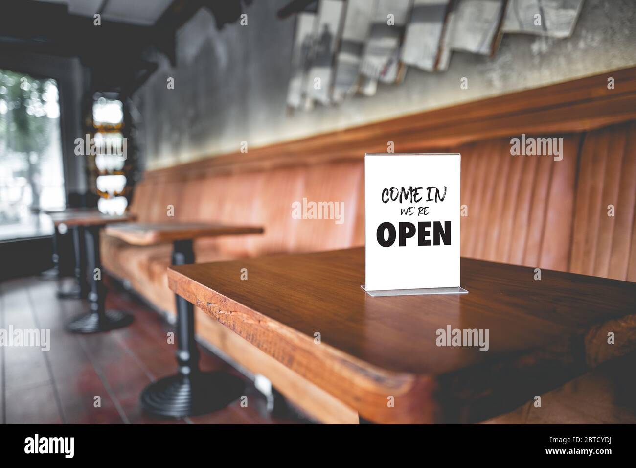 Come in we're open in cafe owner open startup with cafe shop Stock ...