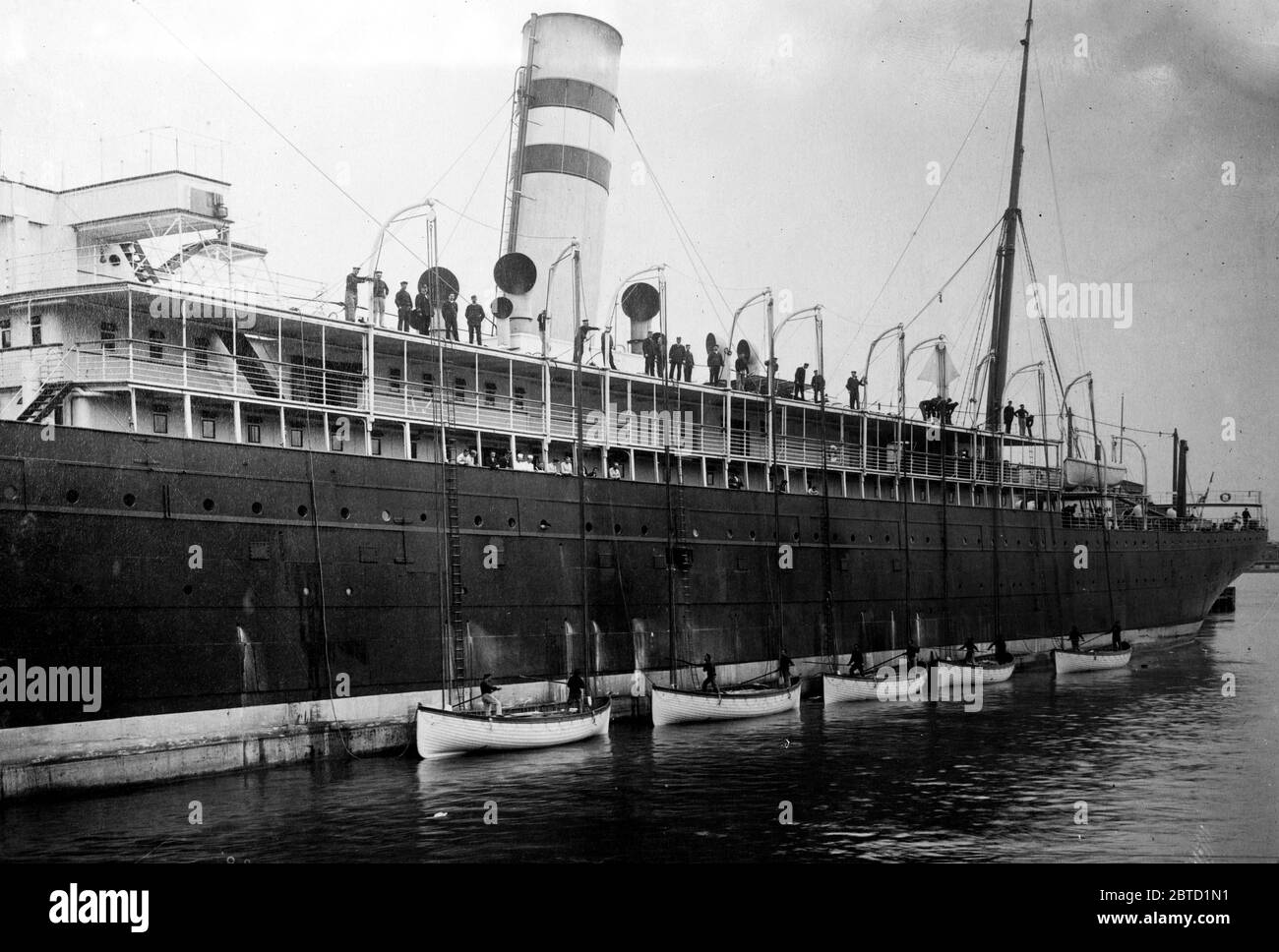 Life boats launched, Holland America line ca. 1910-1915 Stock Photo - Alamy