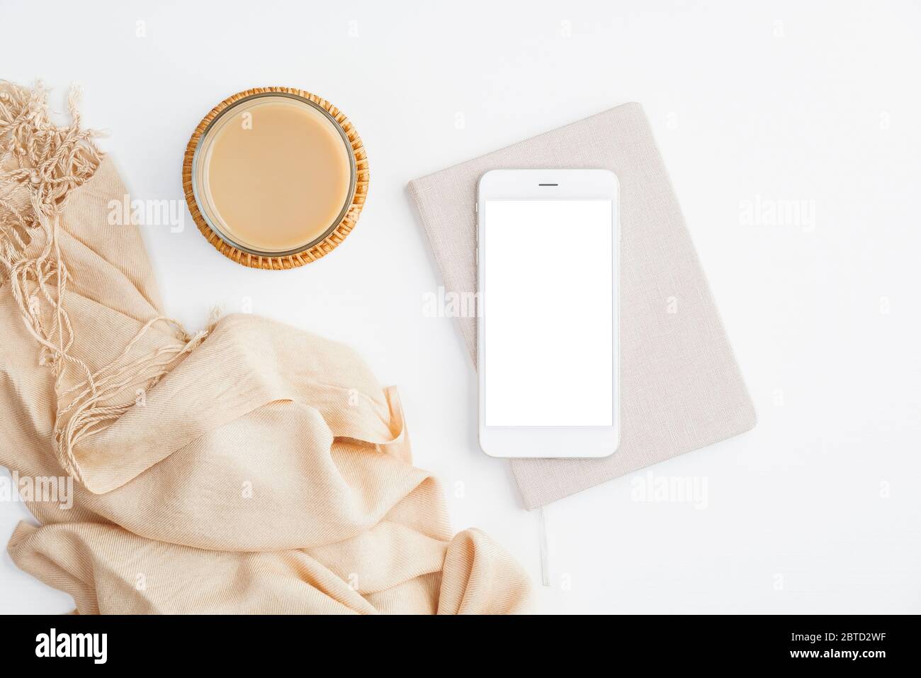 Flat lay mobile phone mockup with blank white screen, paper notebook ...