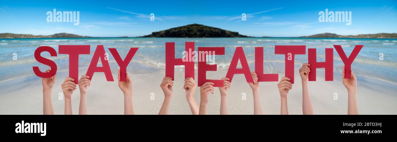 People Hands Holding Word Stay Healthy, Ocean Background Stock Photo ...