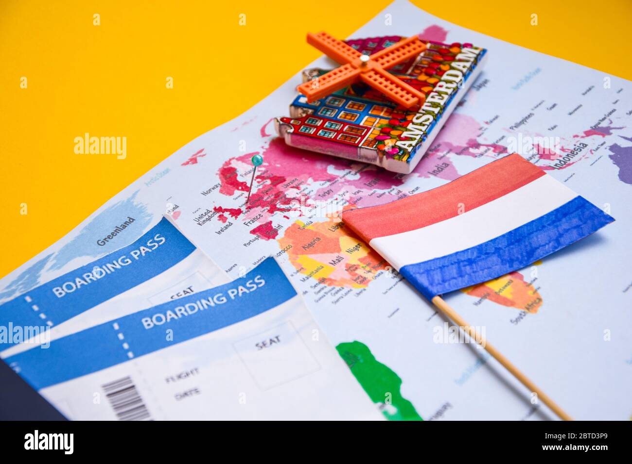 Netherlands travel concept, passport with boarding pass, magnet from ...