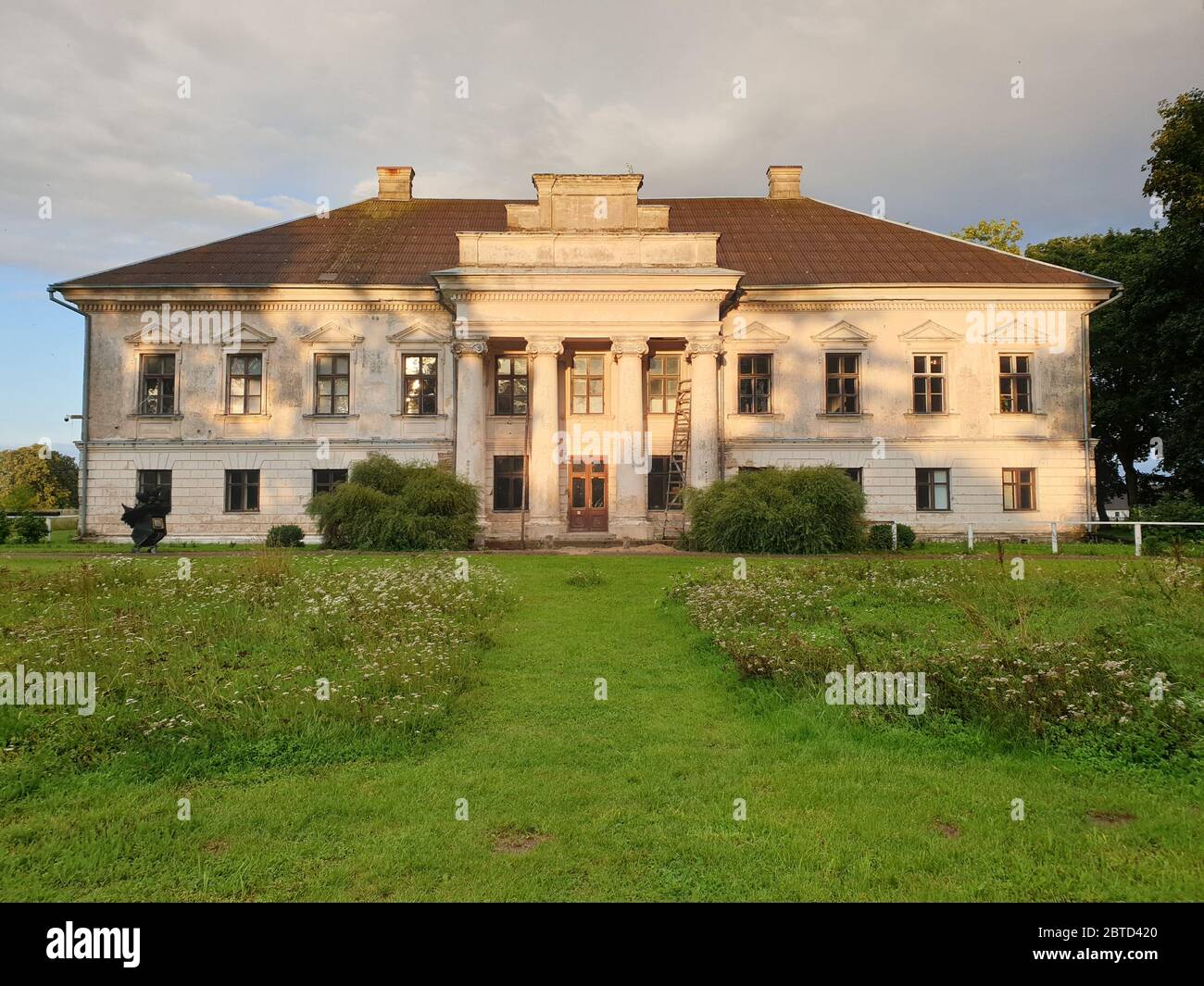 Old manor with sunset light Stock Photo - Alamy