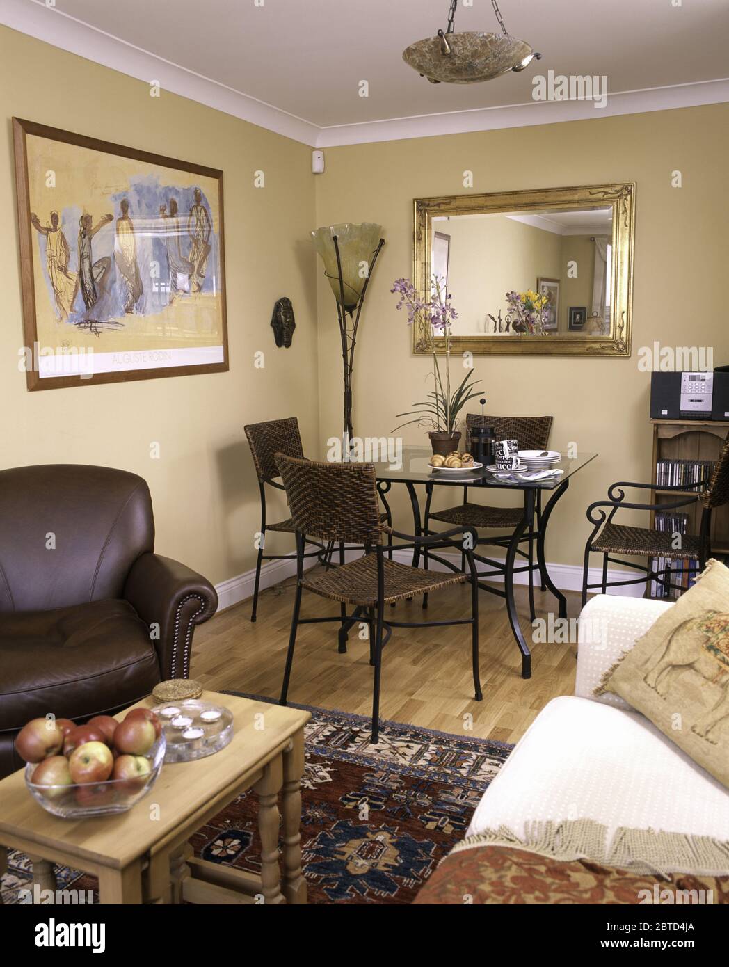 Metal table and chairs in living dining room Stock Photo - Alamy
