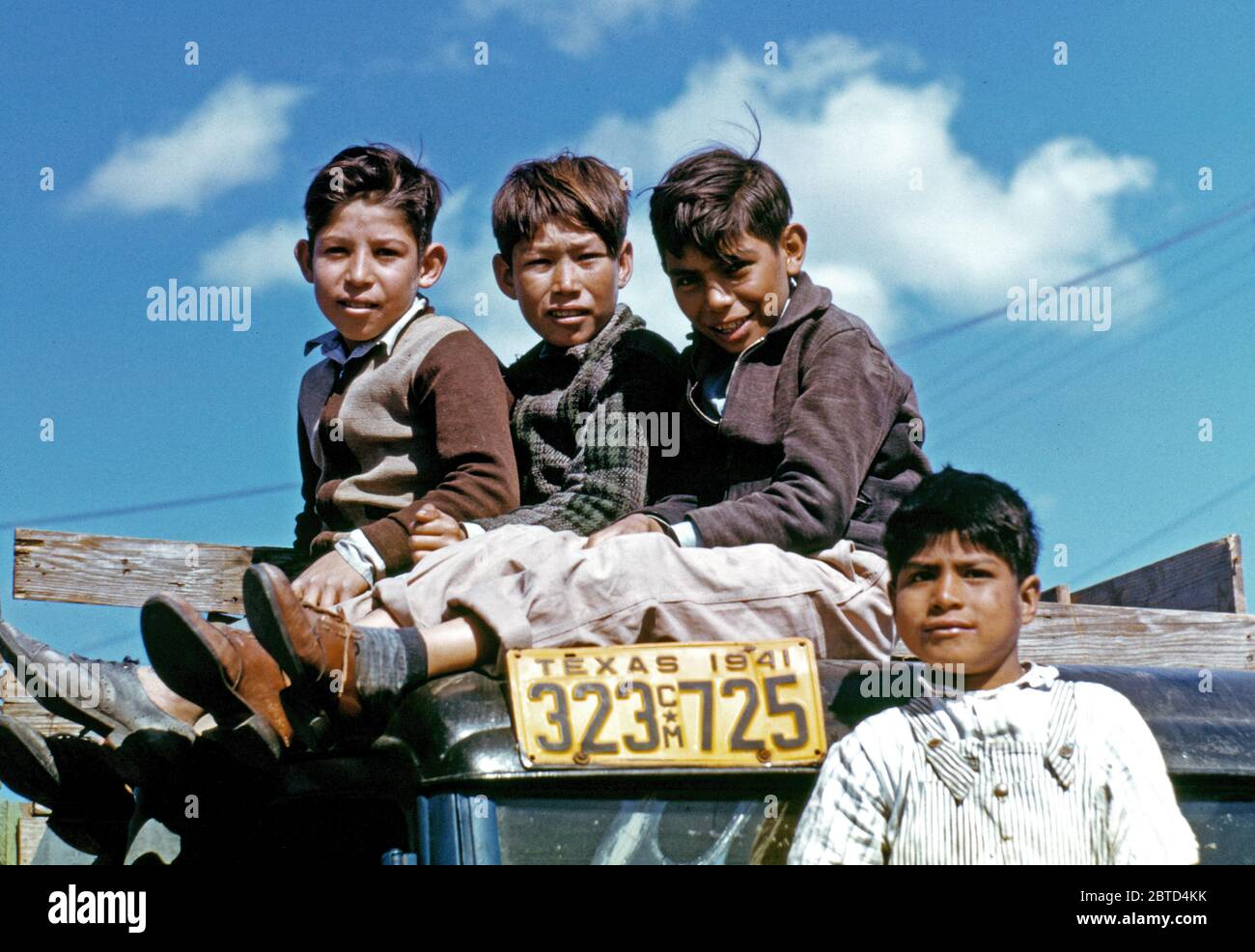 Boys sitting on truck parked at the FSA ... labor camp, Robstown, Tex ...