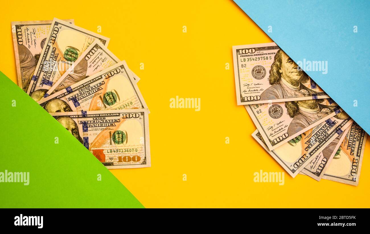 Cash Money on colorful background, Fan of 100 dollar bills on color ...