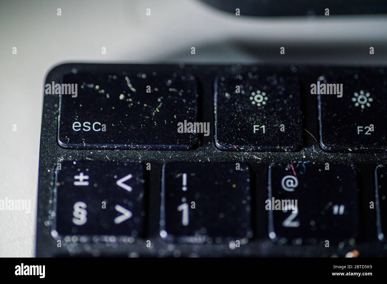 Dusty full with microbes and germs black keyboard risk of infection and ...