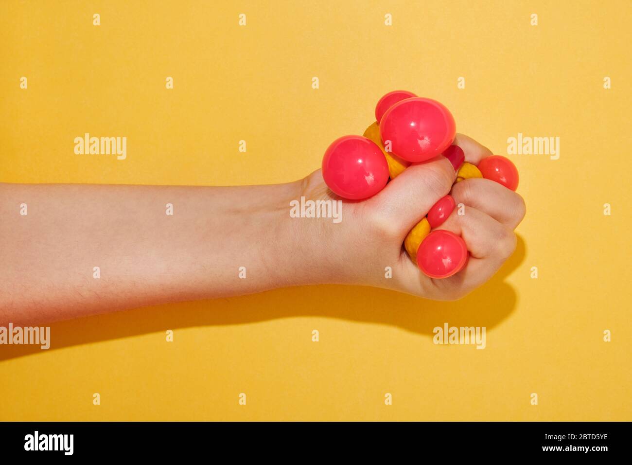 Hand squeezing ball hi-res stock photography and images - Alamy
