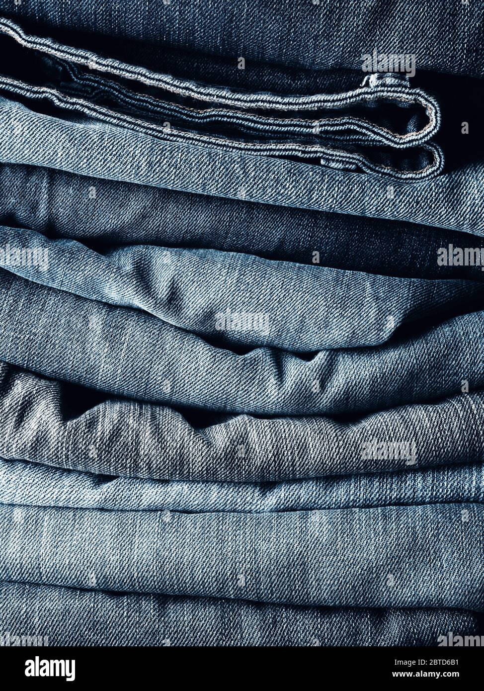 Stacked blue jeans hi-res stock photography and images - Alamy
