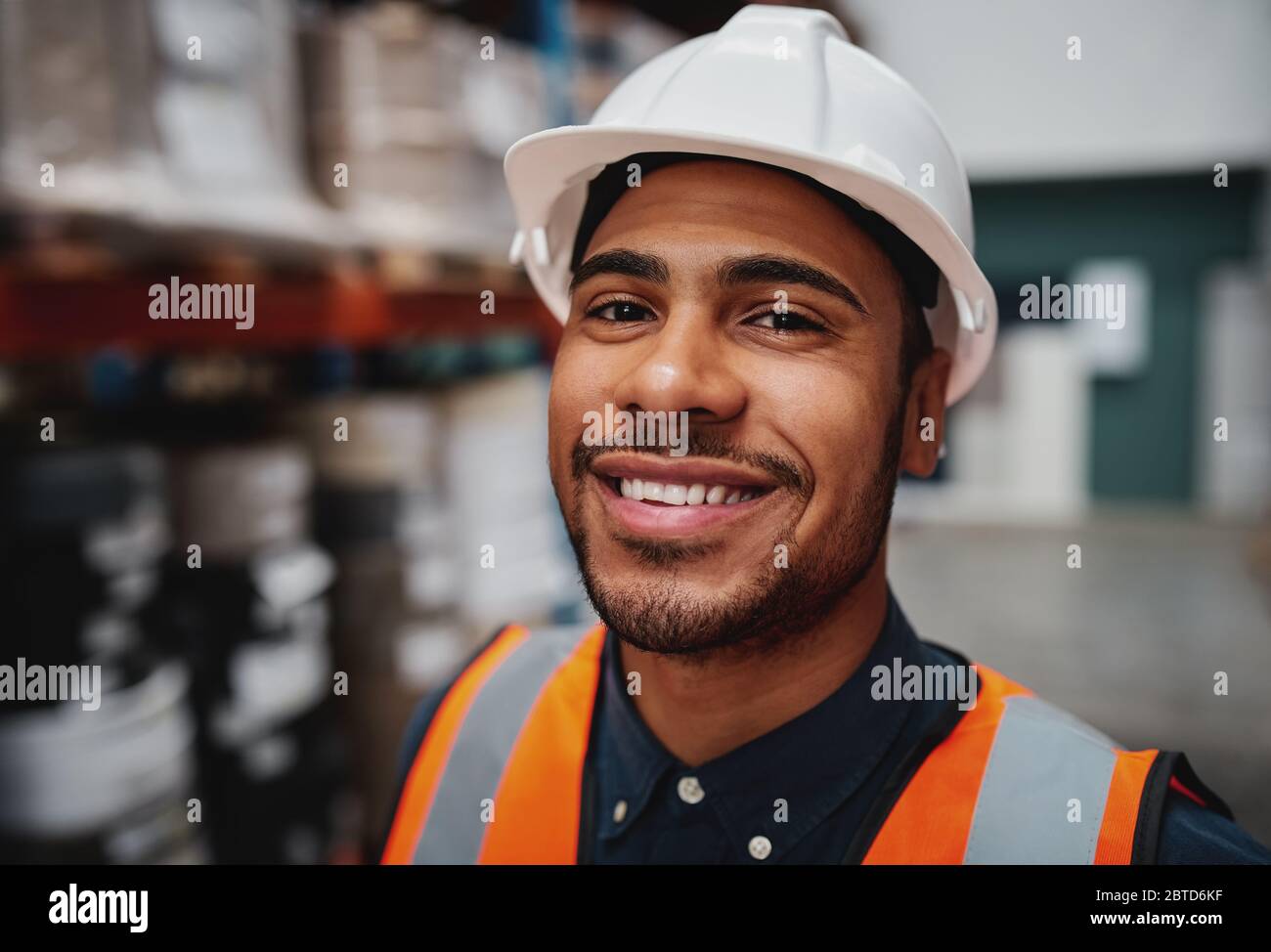 Warehouse manager wearing hard hat hi-res stock photography and images ...