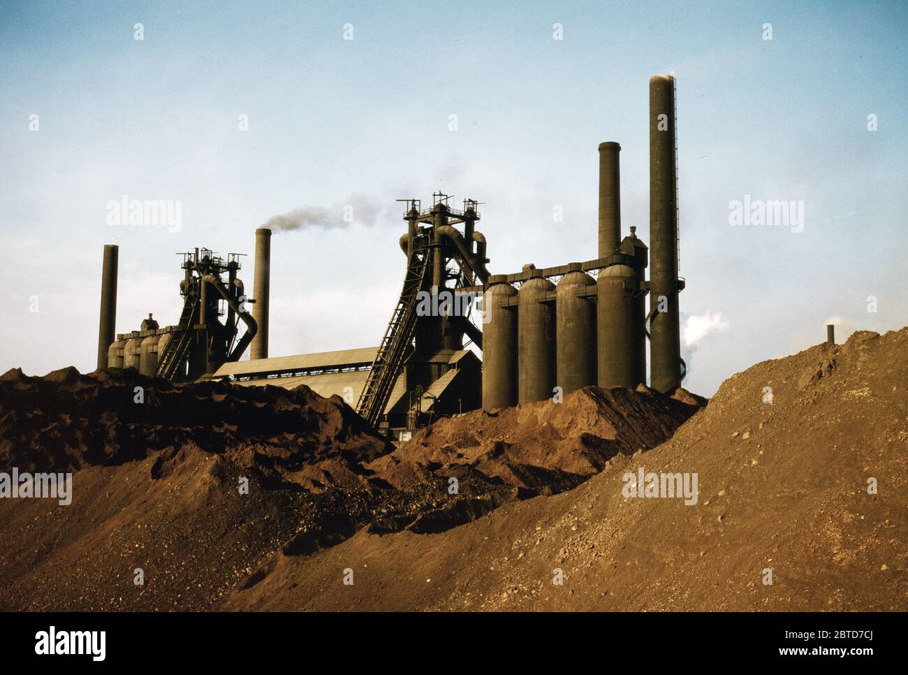 Iron ore piles and blast furnaces, Carnegie-Illinois Steel Corporation ...