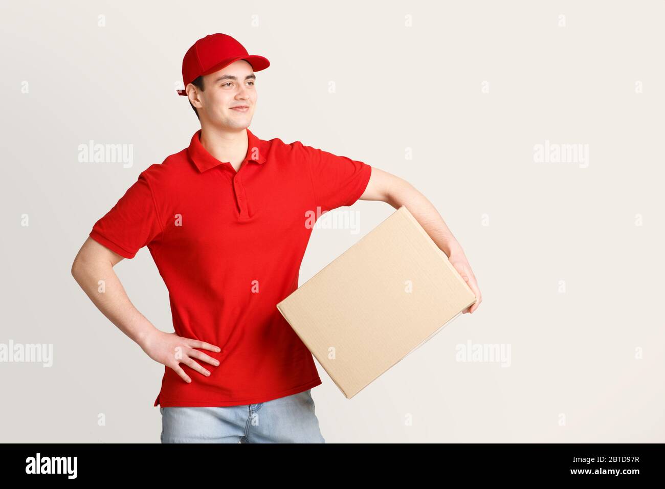 Delivery man big parcel on hi-res stock photography and images - Alamy