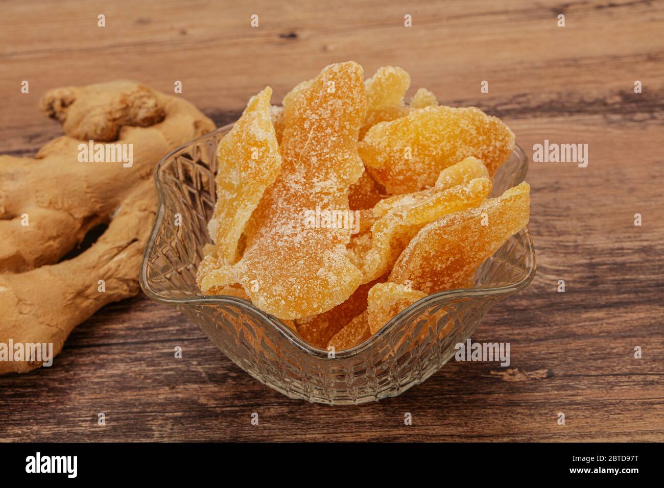 Dry sweet ginger snack in the bowl Stock Photo - Alamy