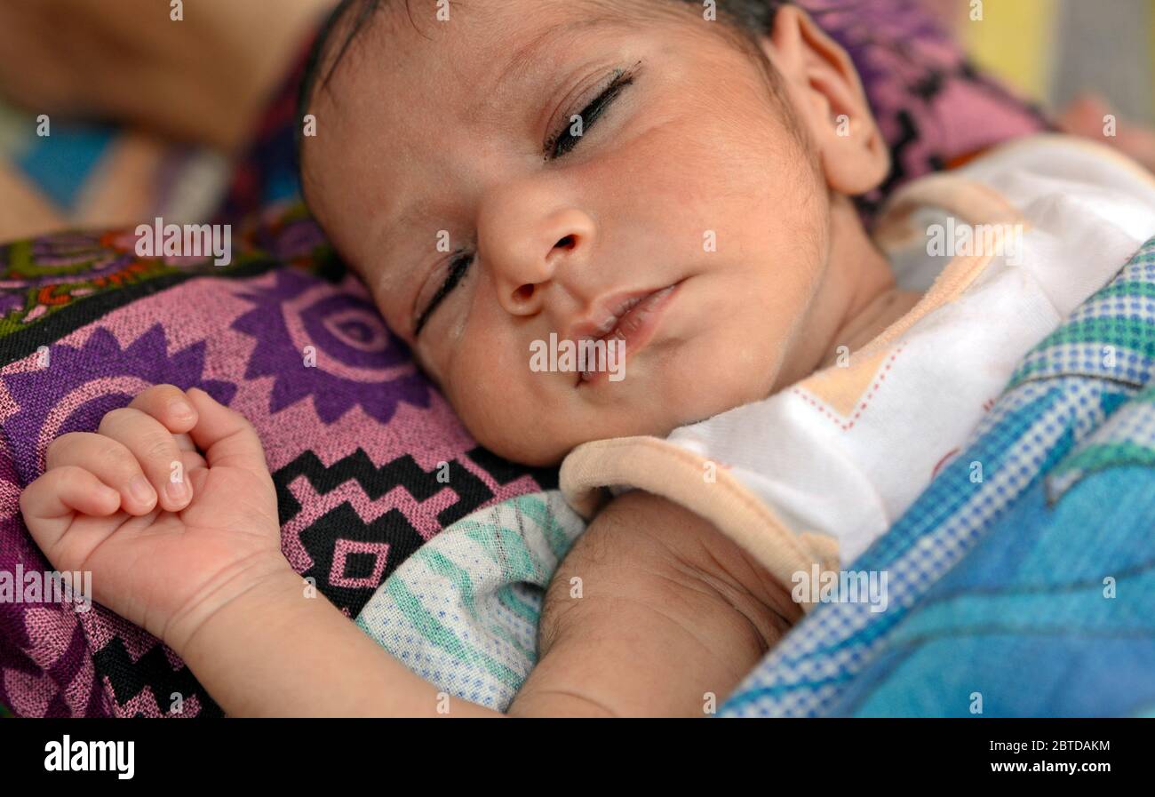 Indian baby sleeping hi-res stock photography and images - Alamy