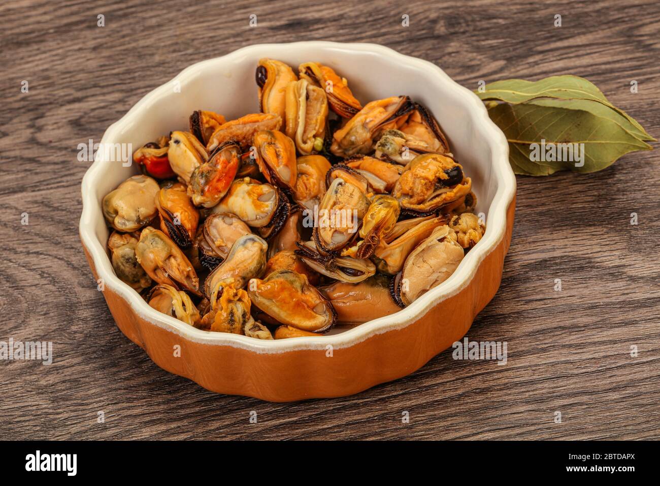 Pickled mussels with spices in the bowl Stock Photo - Alamy