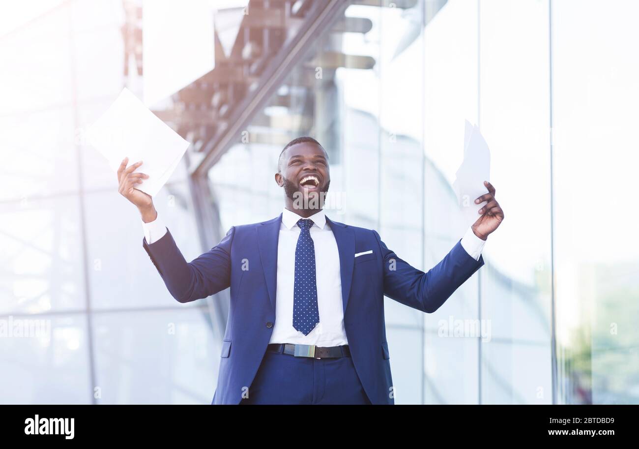 Businessman Shouting In Joy Throwing Papers Celebrating Promotion ...