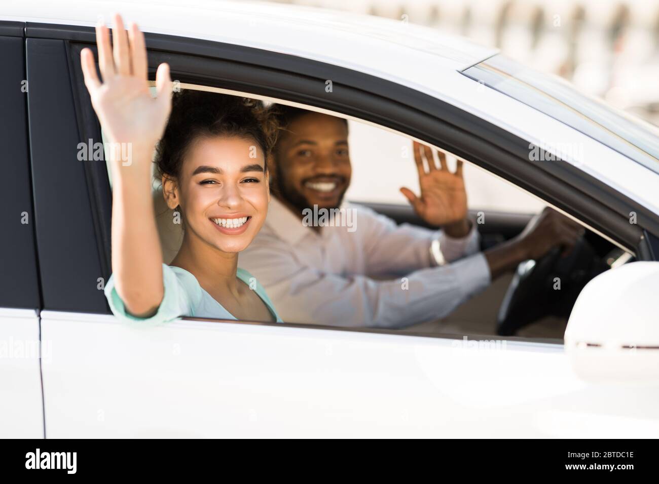 People waving bye hi-res stock photography and images - Alamy