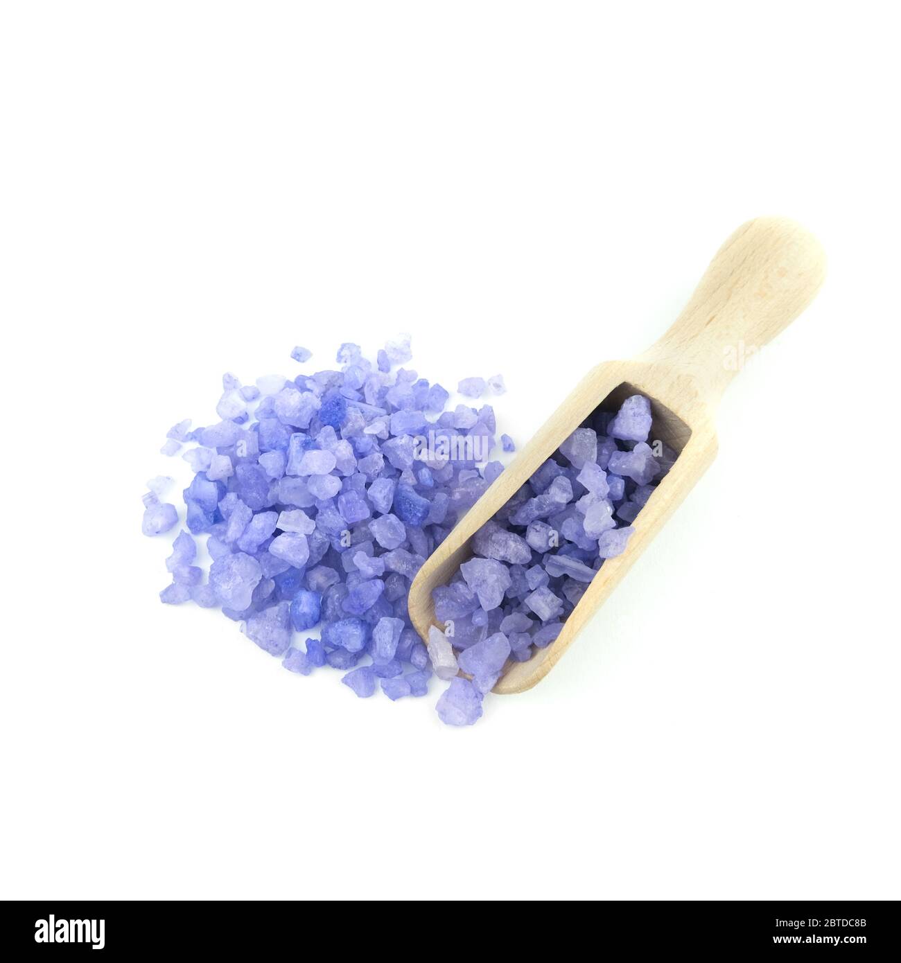 Purple sea salt with wood scoop isolated on white background Stock ...