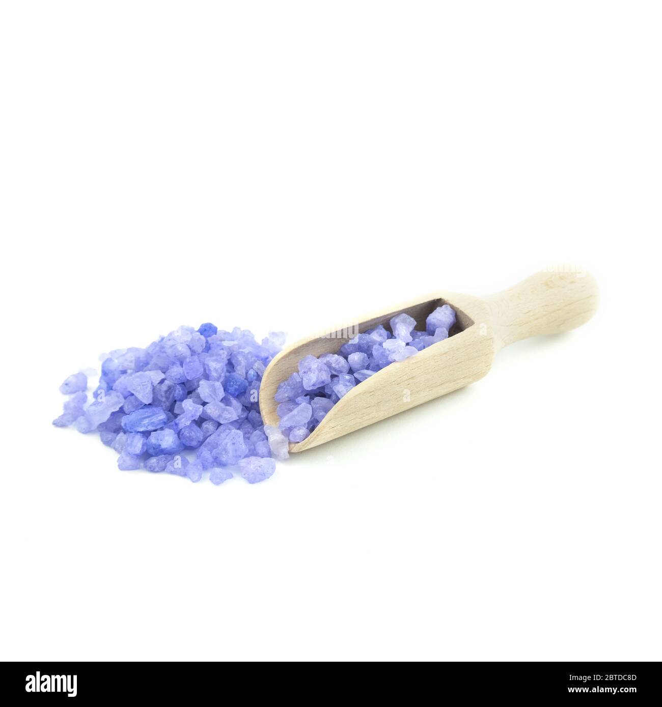 Purple sea salt with wood scoop isolated on white background Stock ...