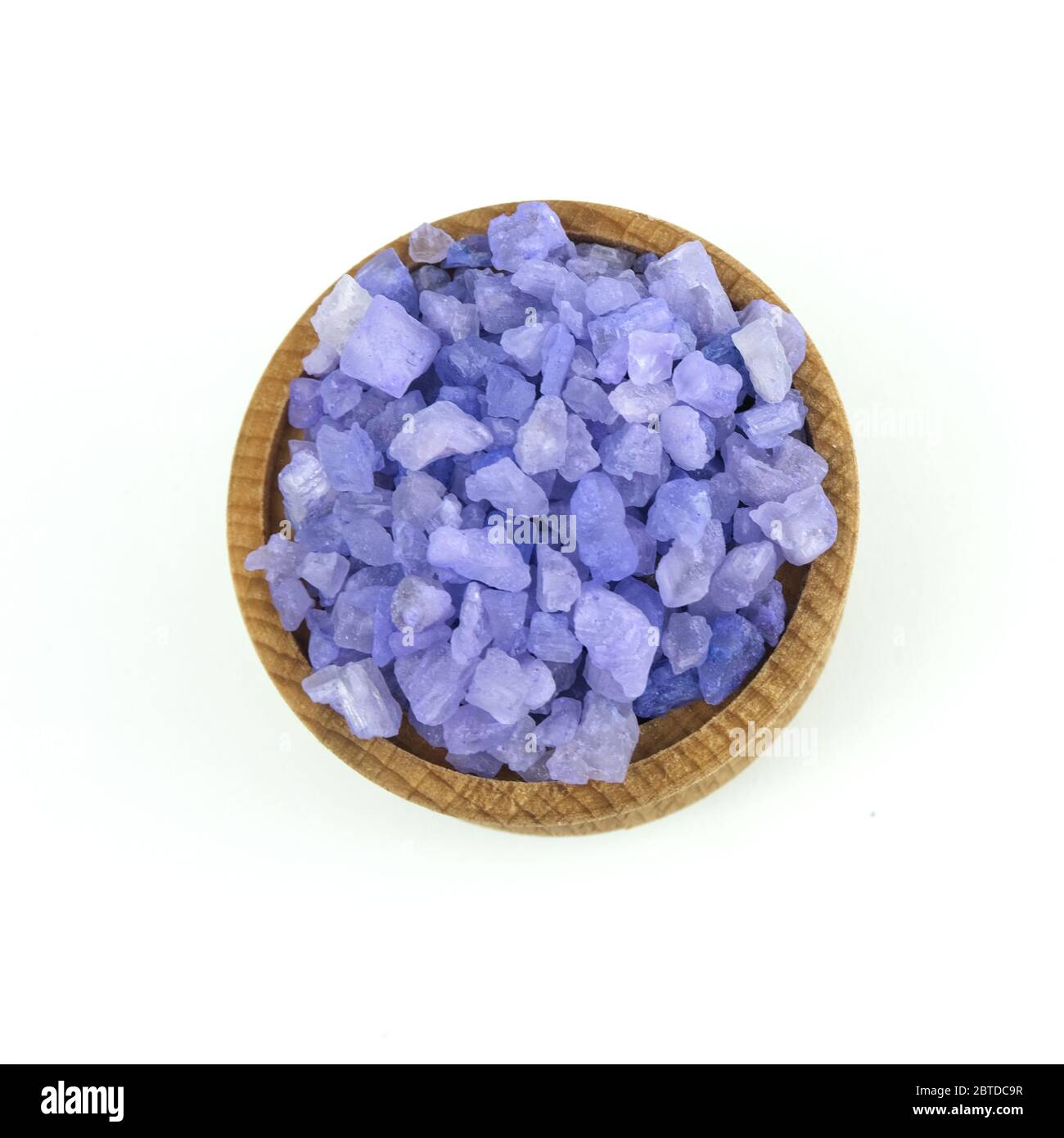 Purple sea salt in wood bowl isolated on white background Stock Photo ...