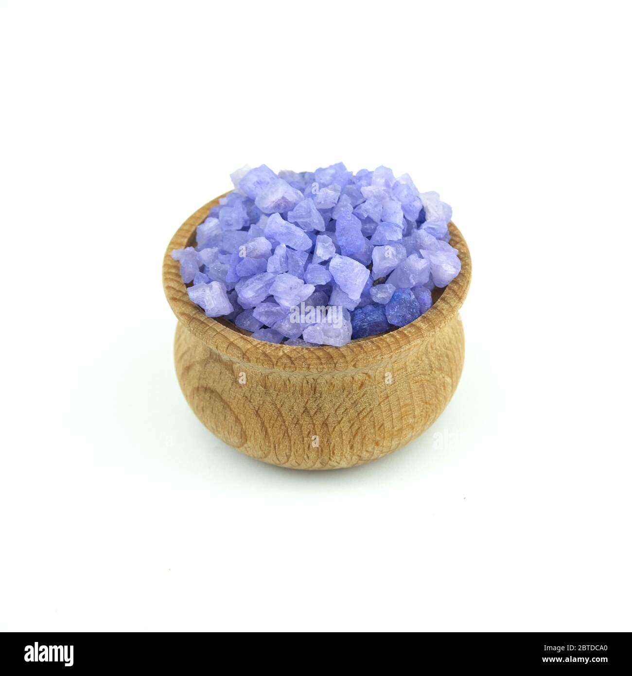 Purple sea salt in wood bowl isolated on white background Stock Photo ...