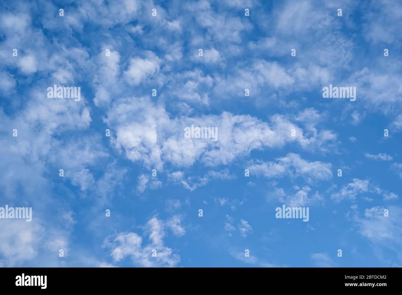 Blue sky lots small clouds hi-res stock photography and images - Alamy