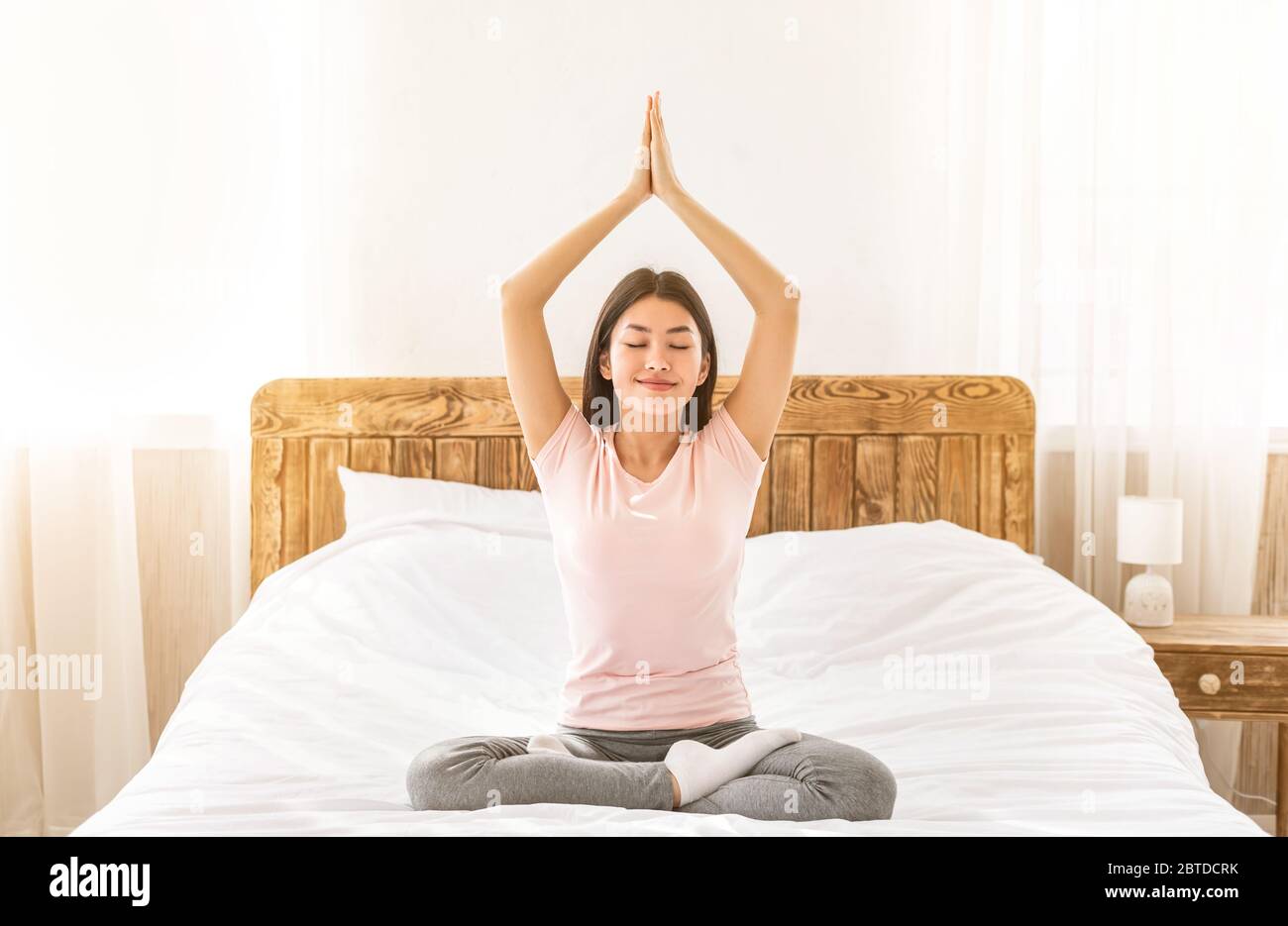 Chinese girl doing yoga hi-res stock photography and images - Alamy