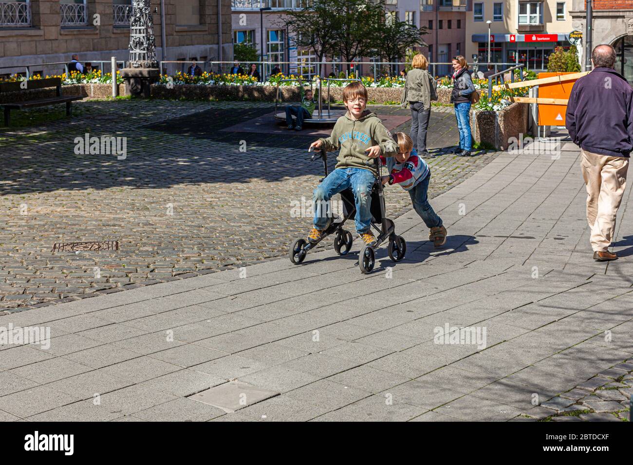 Grandson is playing with Grandmother's Rollator in Aachen, Germany ...