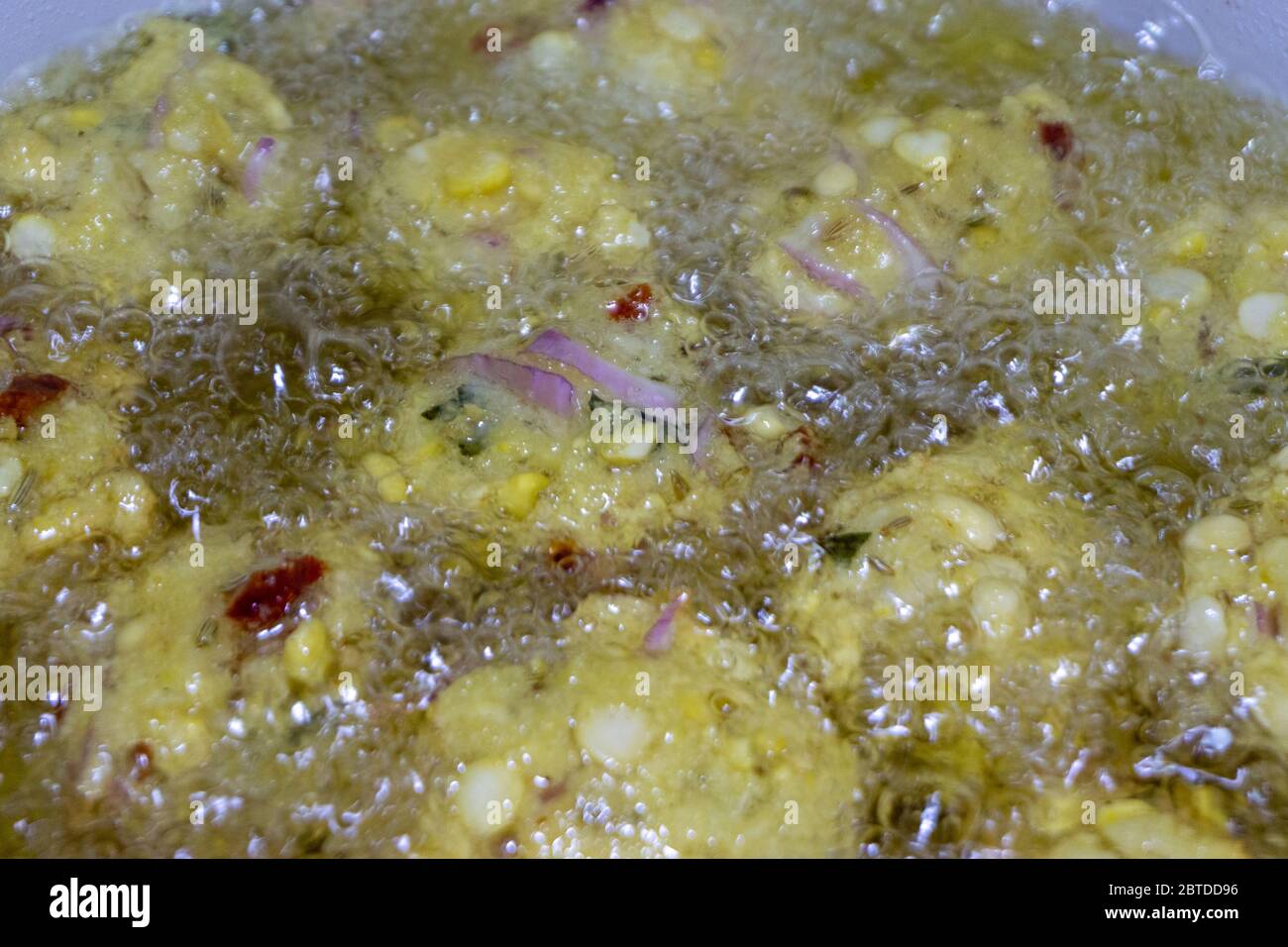 Fried cook of Batate Vade, Batate Vadey, Fried Dhal Beans Cake or Kuih ...