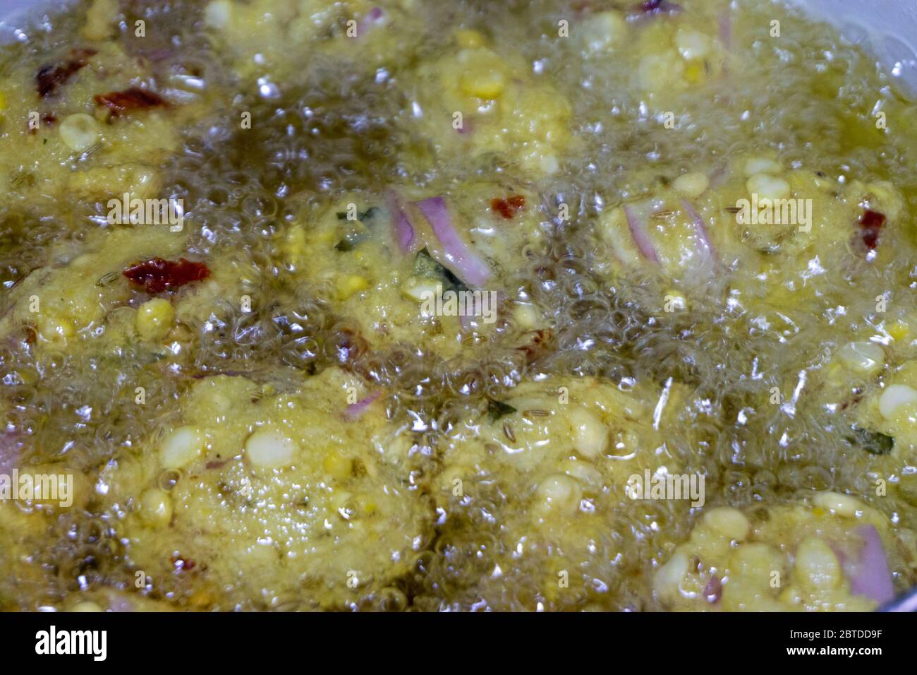 Fried cook of Batate Vade, Batate Vadey, Fried Dhal Beans Cake or Kuih ...