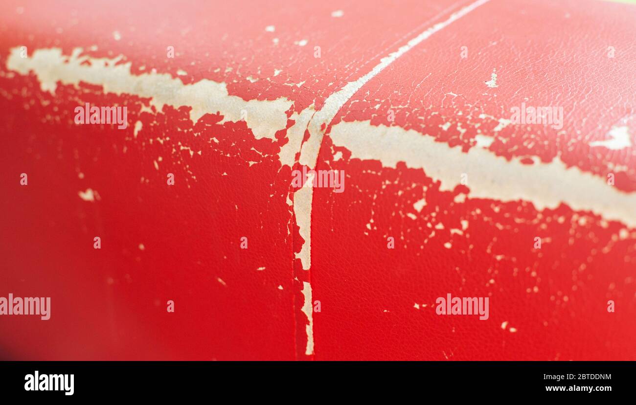 Damaged leather texture on the upholstery of the sofa and furniture ...