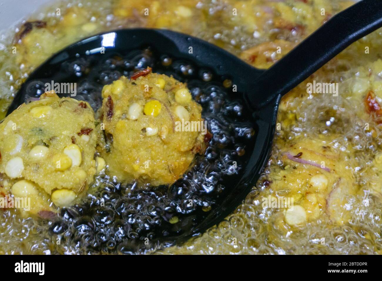 Fried cook of Batate Vade, Batate Vadey, Fried Dhal Beans Cake or Kuih ...