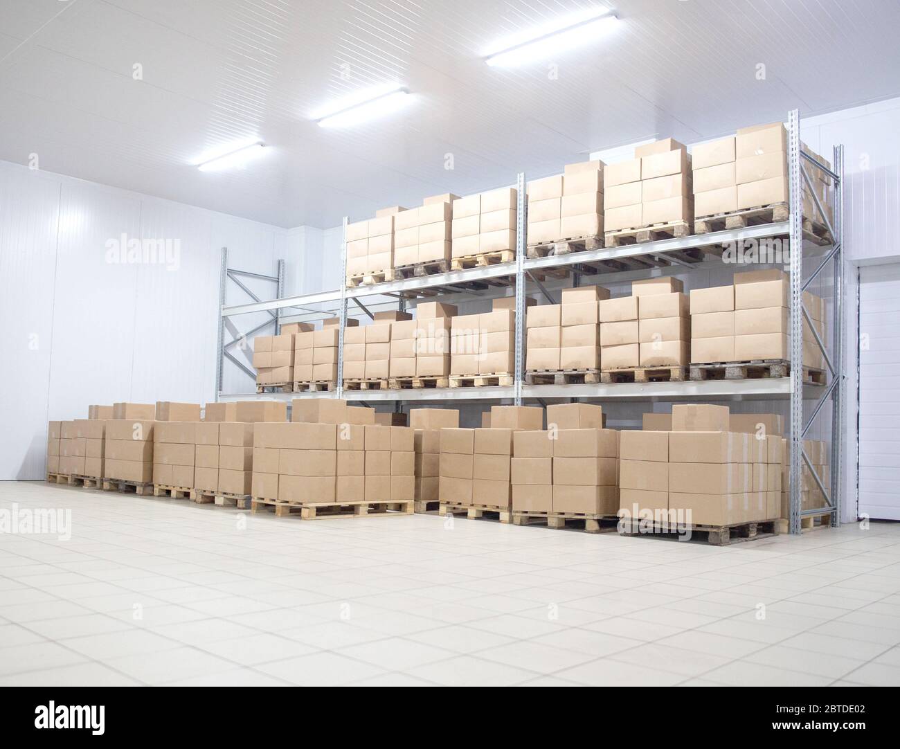 Modern warehouse refrigerator finished goods in cardboard boxes ...