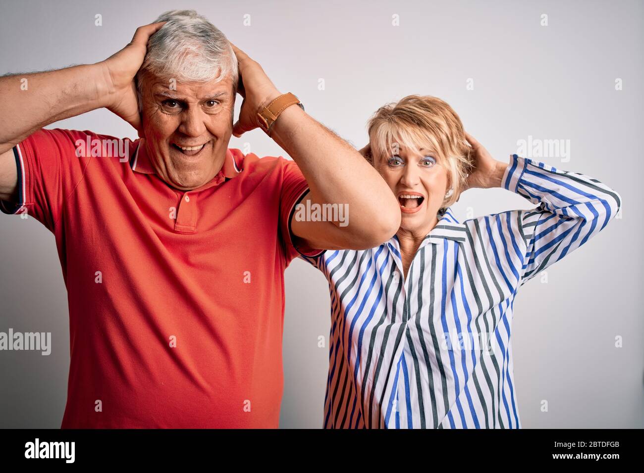 Senior beautiful couple standing together over isolated white ...