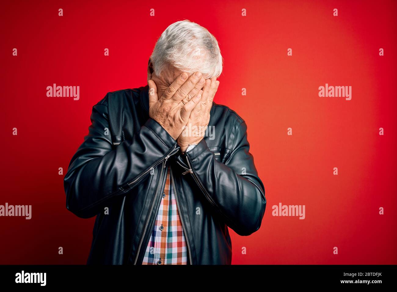 Senior handsome hoary man wearing casual shirt and jacket over isolated ...