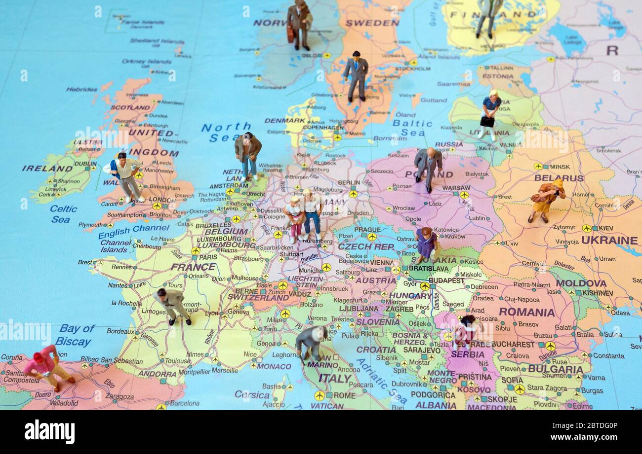 Many figures of people are placed on Europe map. Open borders concept ...