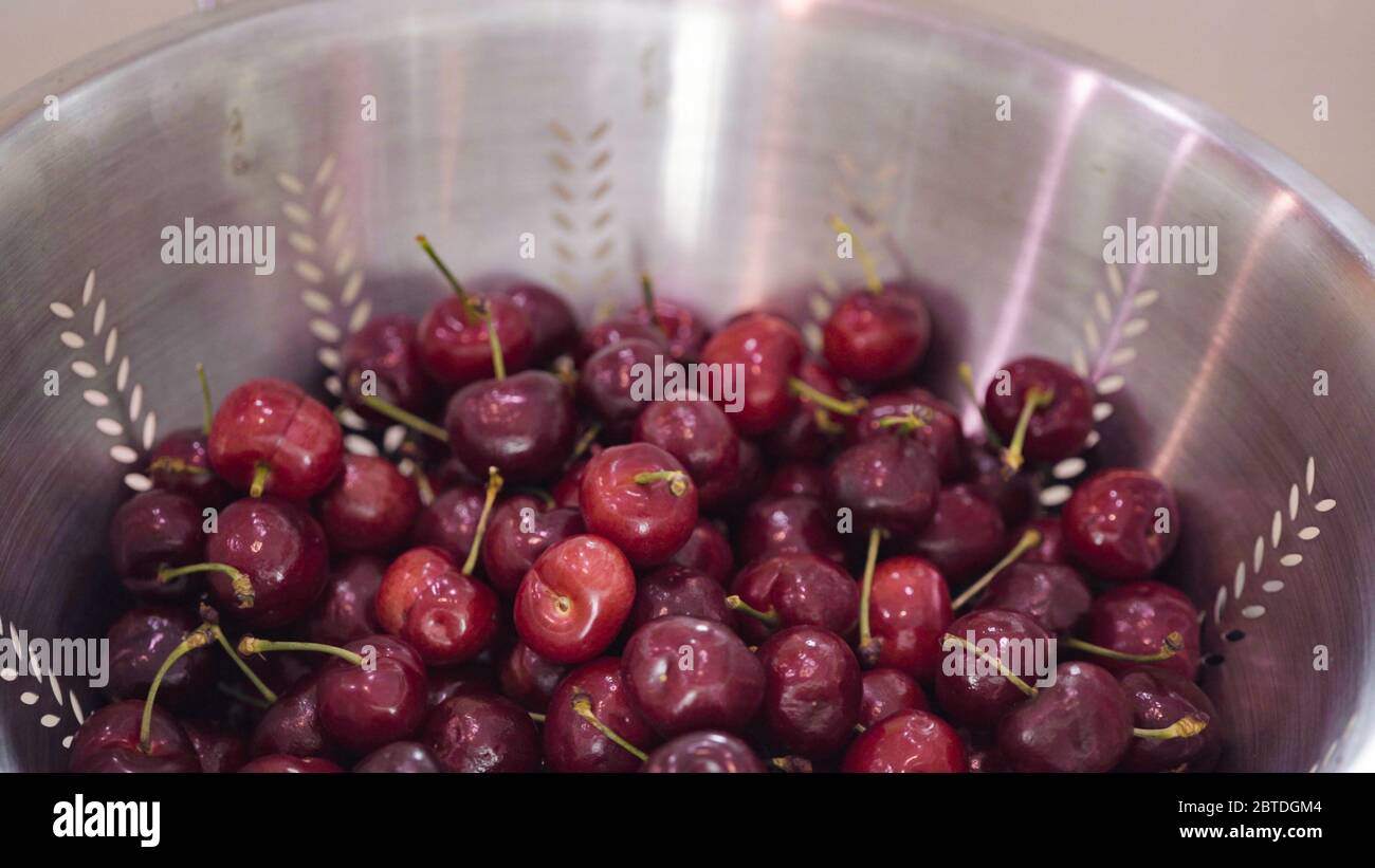 Washing ripe cherries close hi-res stock photography and images - Alamy